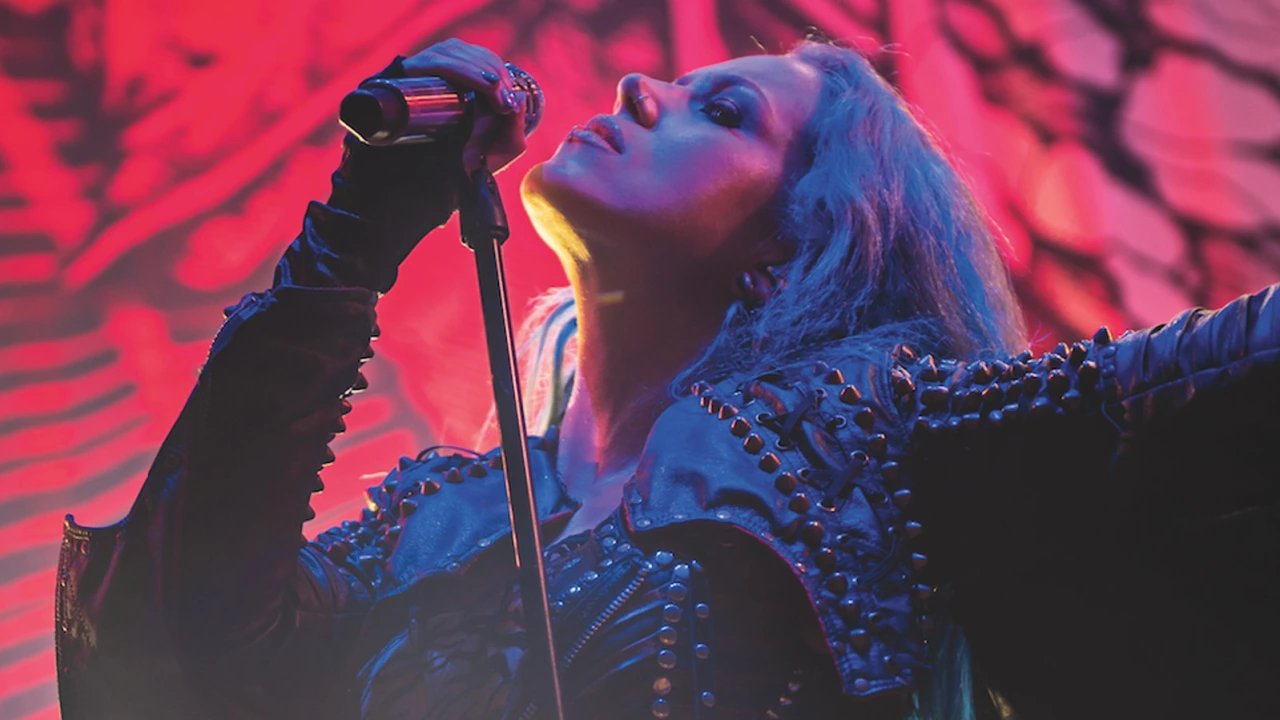 See ARCH ENEMY singer become trapped mermaid in new PETA ad