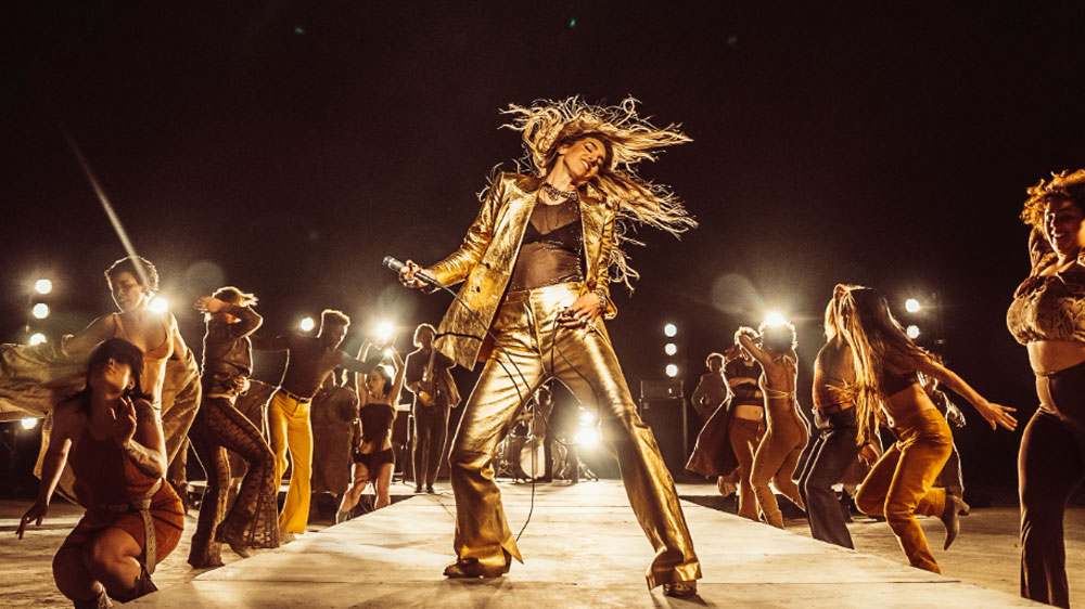 See MISS VELVET rock the catwalk in video for swaggering new song "STRUT"