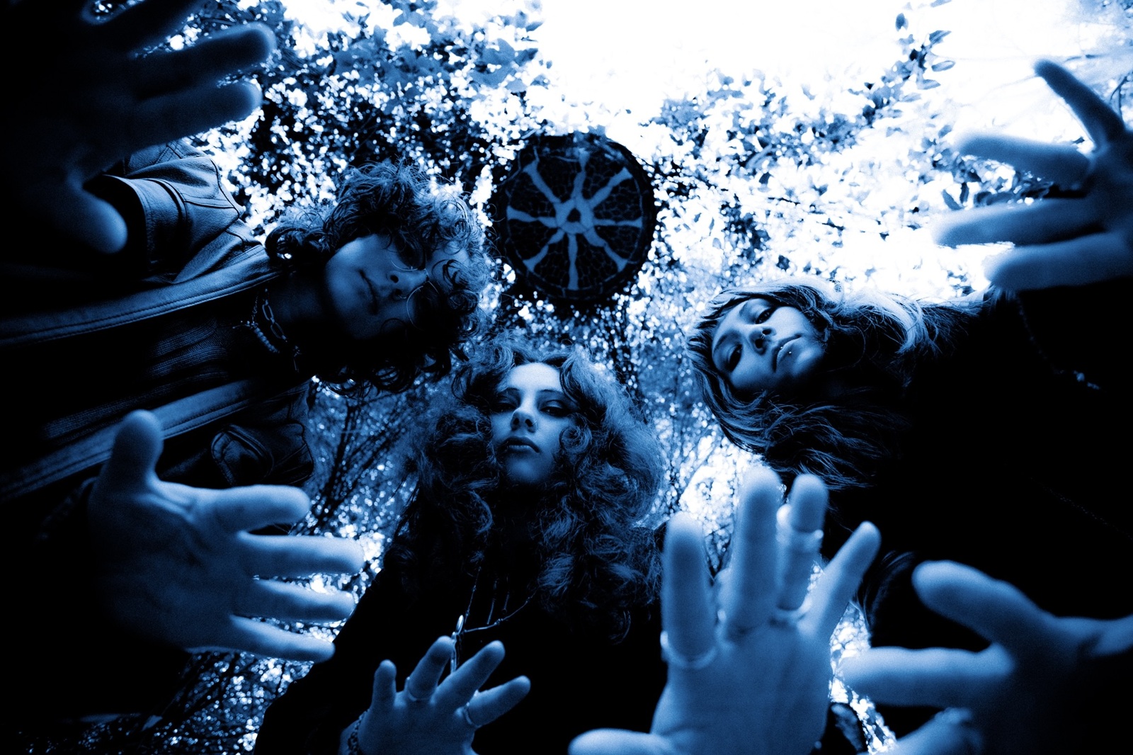 Hear "fairy-doom" trio FAETOOTH's sludgy new song "White Noise"